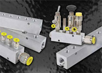 In-line Manifolds Feature Bottom T-slot Mounting | Power & Motion